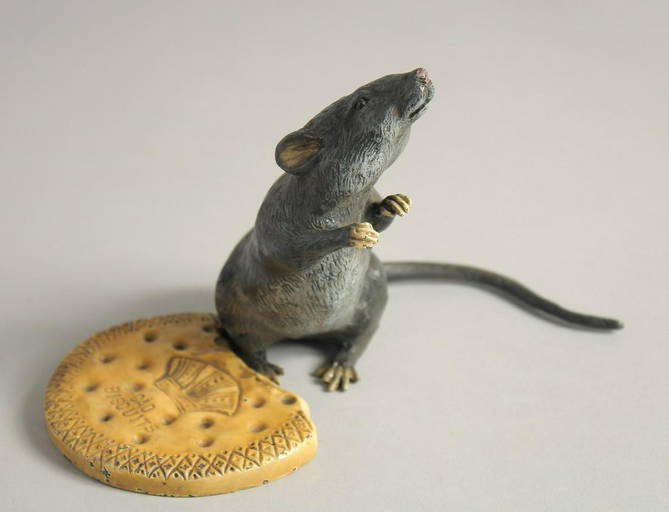 A Cold Cast Model Of A Rat Standing Beside A Biscuit. 4.5ins High.