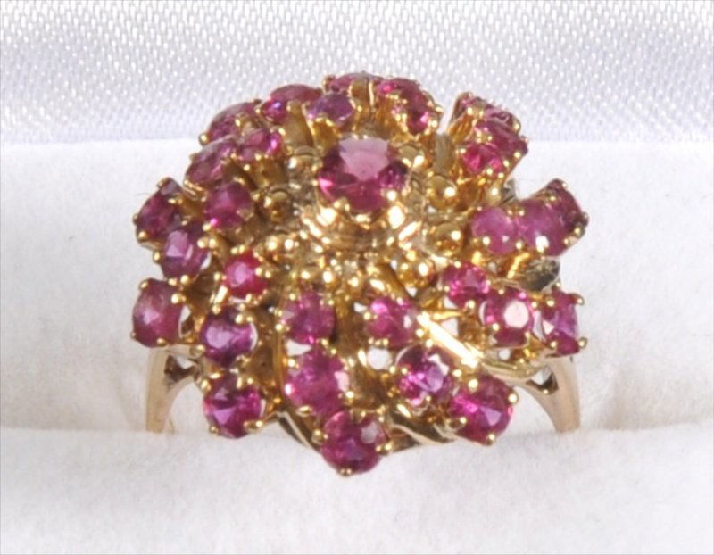 A Ruby And Gold Dress Ring.