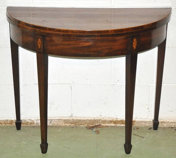 A Georgian Mahogany Half Moon Card Table With Rising To