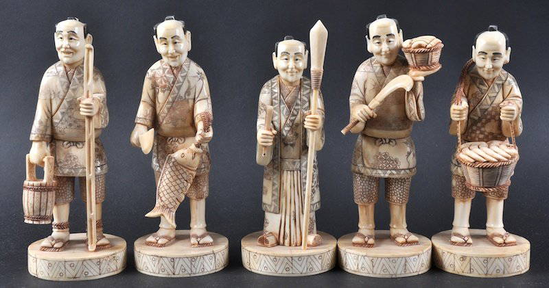 A Set Of Five Japanese Carved Bone Figures Of Standing