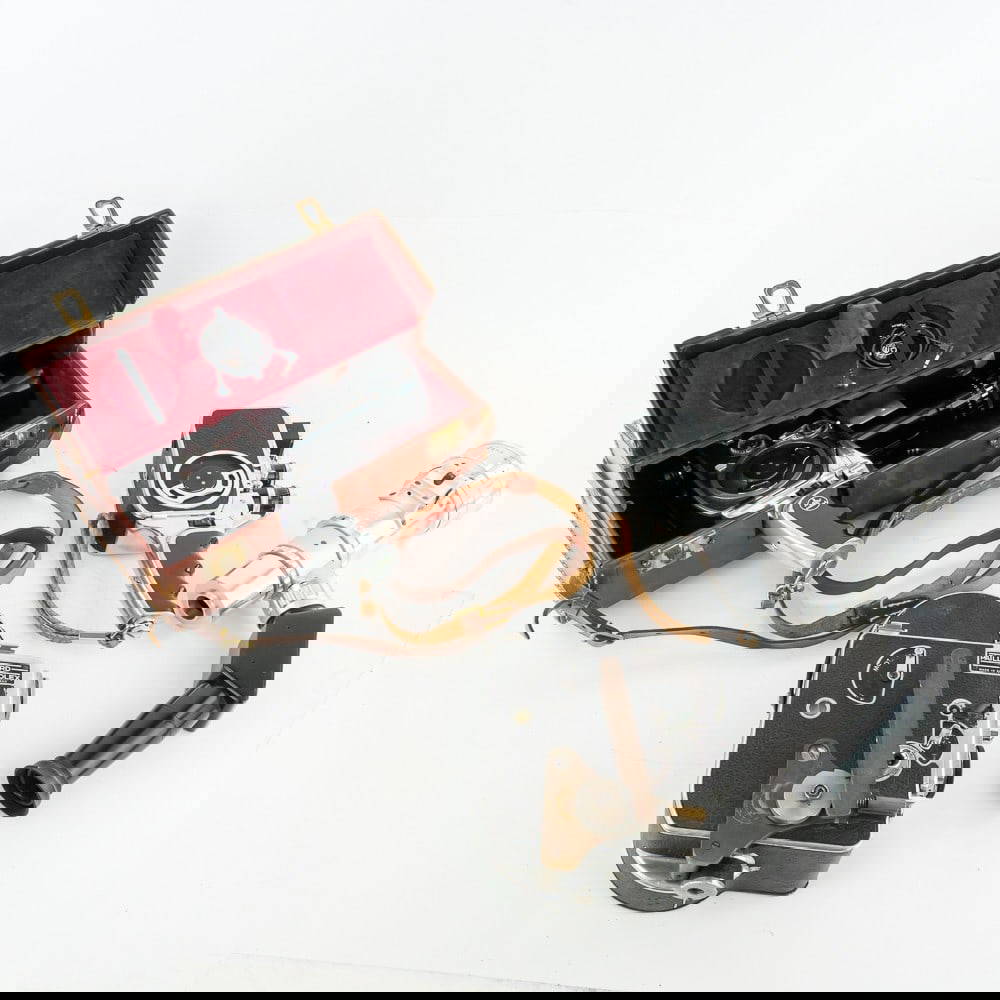 Three Paillard-bolex Movie Cameras And A Lens Auction