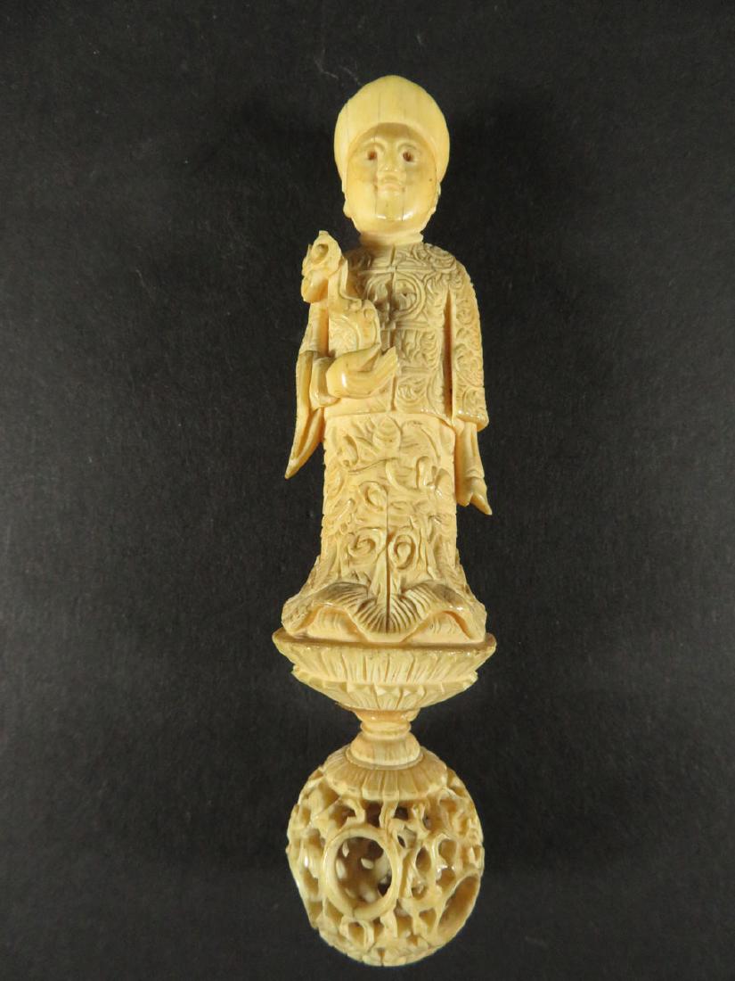 Chinese Figure With Magic Ball