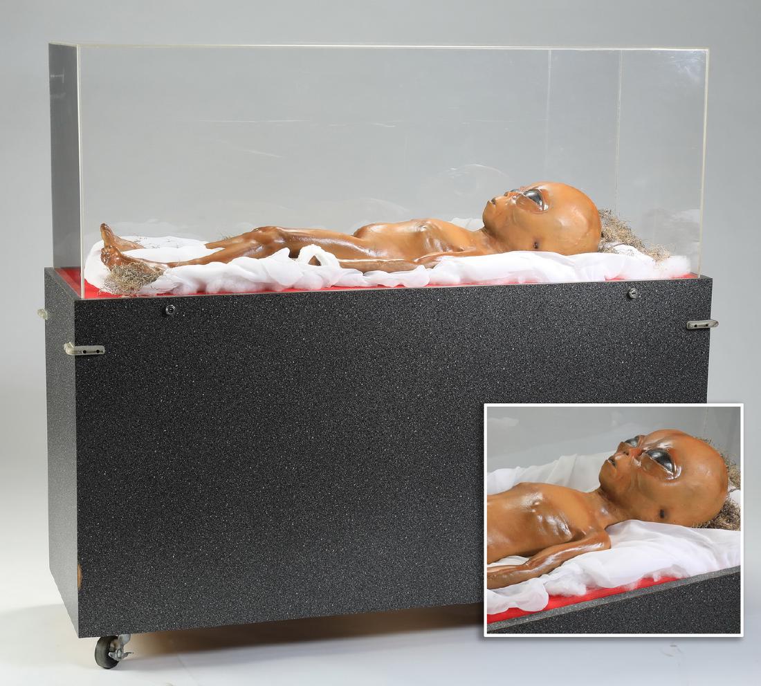 Contemporary alien movie prop in custom display case