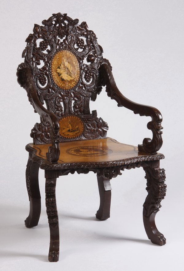 19th c. carved and inlaid Black Forest chair