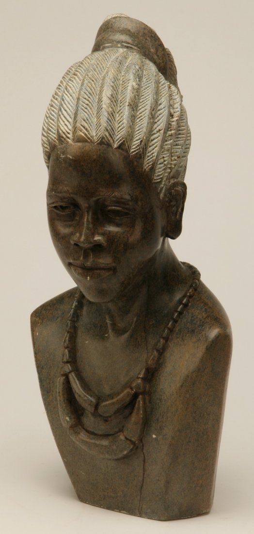 Hand carved marble bust of an African woman