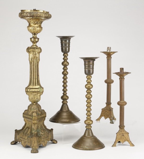 Group of five brass candlesticks