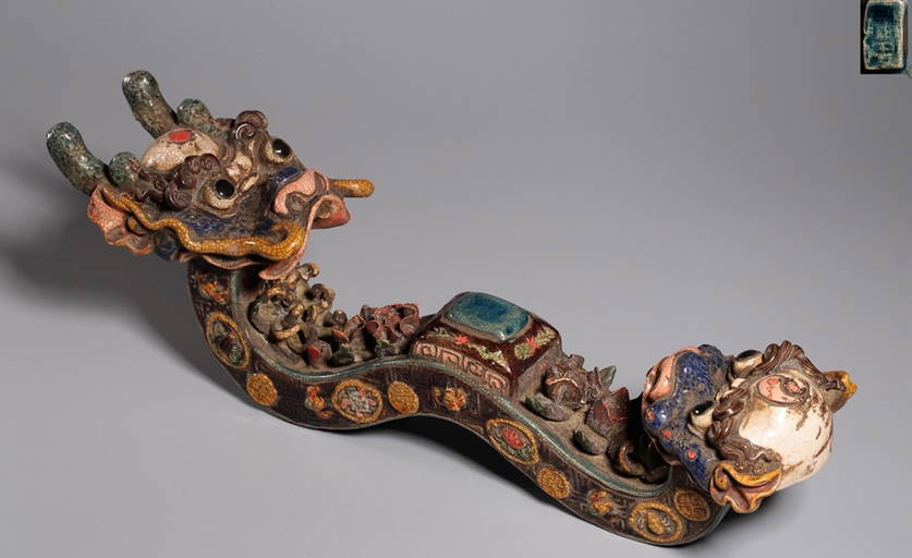 A Clay Glaze Ruyi With Dragons Pattern