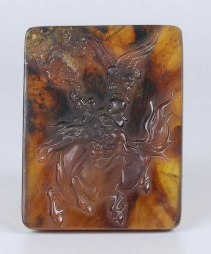 An Amber Tablet Carved With Figure Story