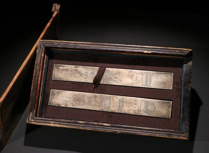 Pair Of Copper Vessel Pattern Paperweights