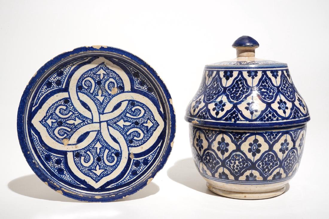A blue and white Islamic pottery covered bowl and a