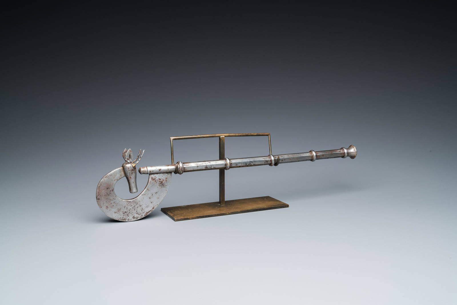 A Steel Mughal-style Antelope-shaped Axe, India, 18/19th C. Auction