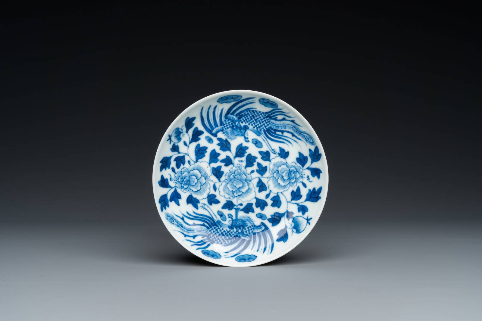 A Chinese Blue And White 'bleu De Hue' Dish With Phoenixes For Dang Huy ...