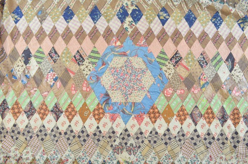 19th century quilt constructed with printed cotton