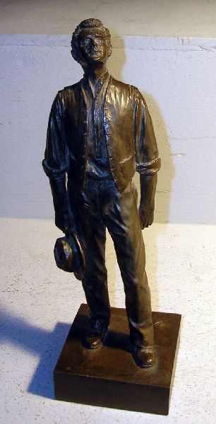 747: Peter Hicks, bronze figure of a man