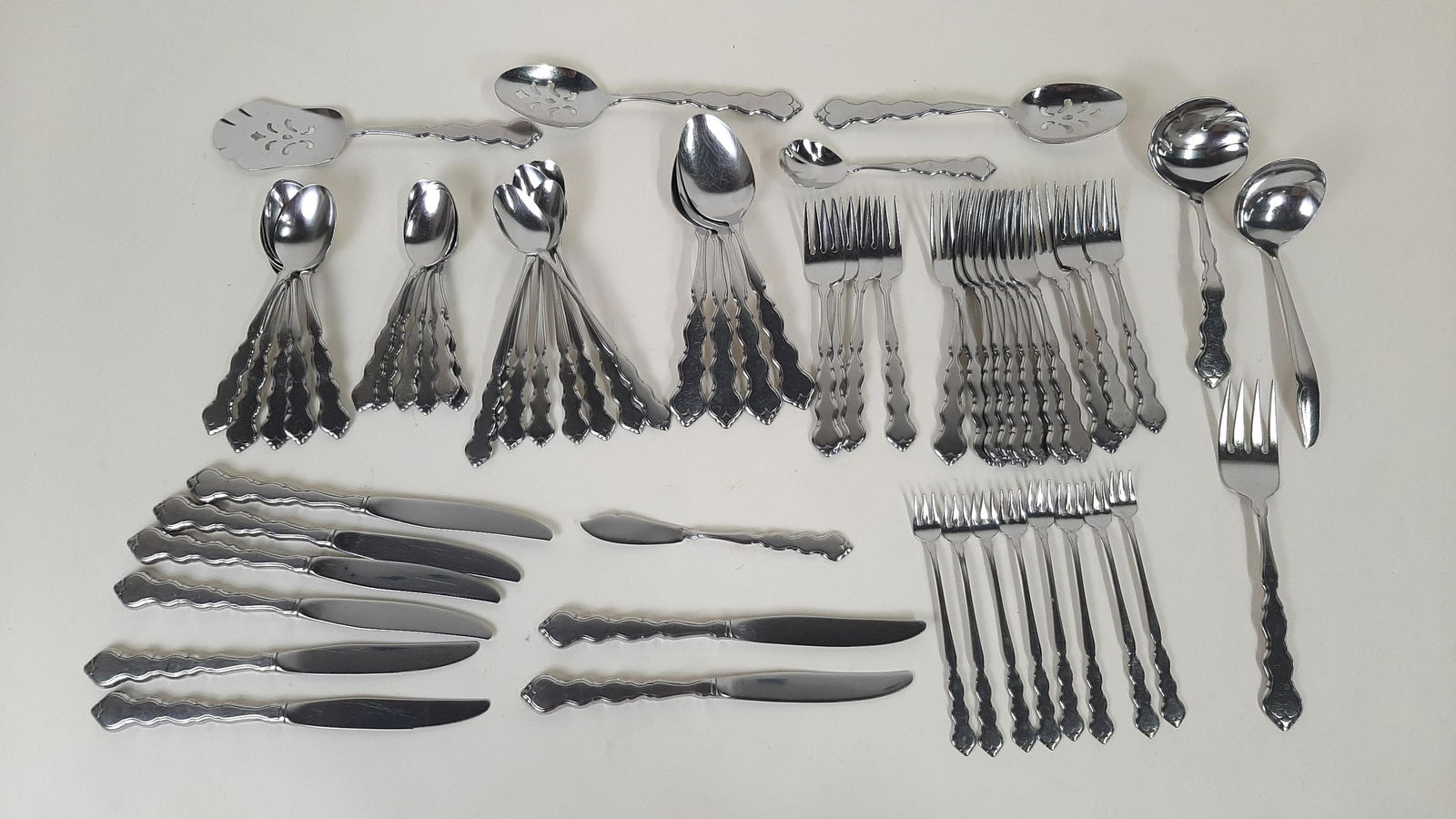 63 Pcs Oneida Stainless Steel Flatware