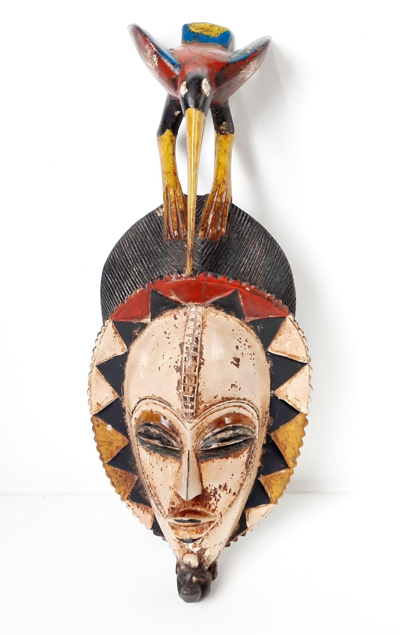 Ivory Coast Tribal Mask With Perched Bird Auction