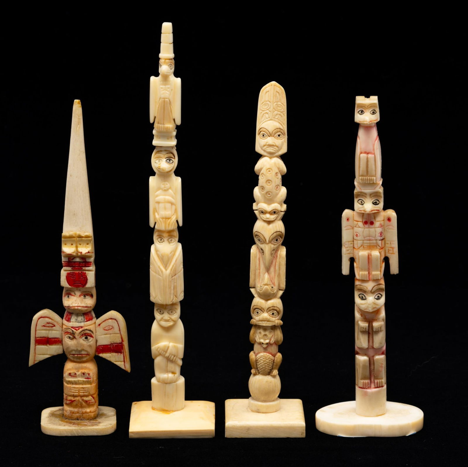 4 Miniature Bone Carved Totem Poles Auction