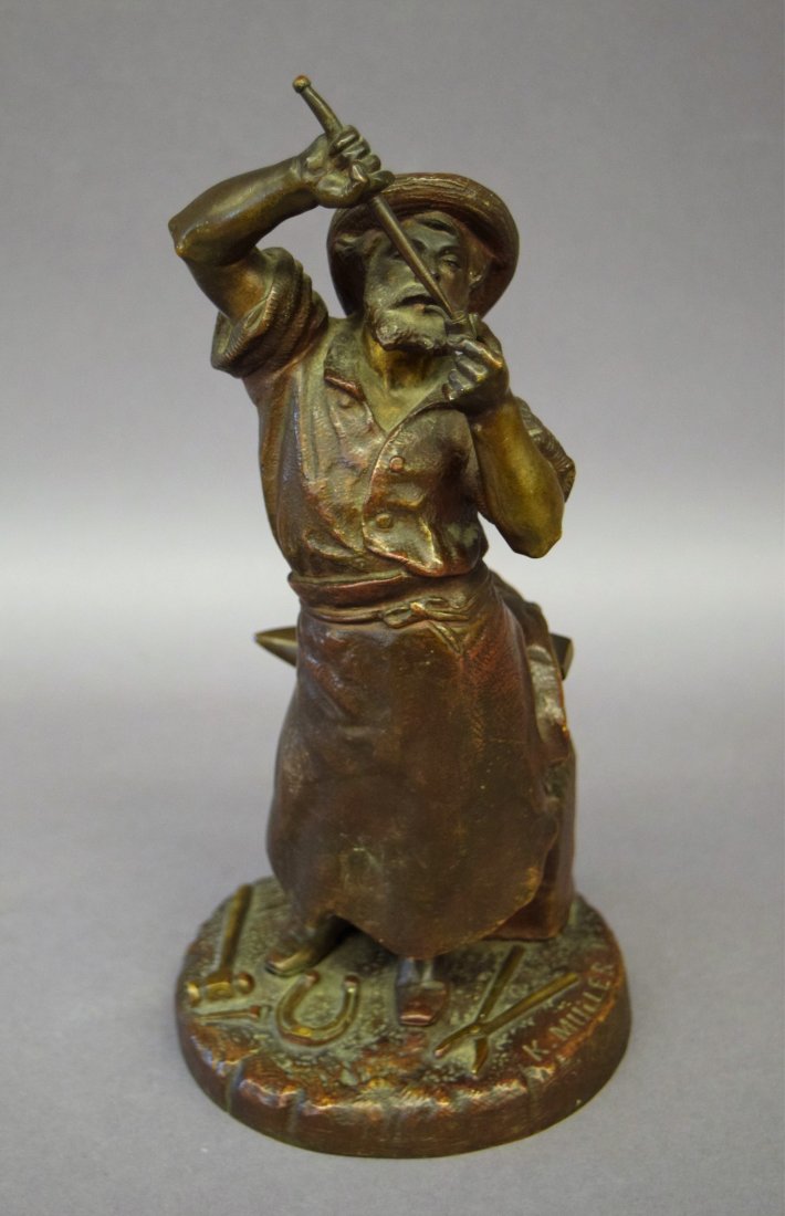 K. Muller, 1857. Bronze sculpture of a Blacksmith