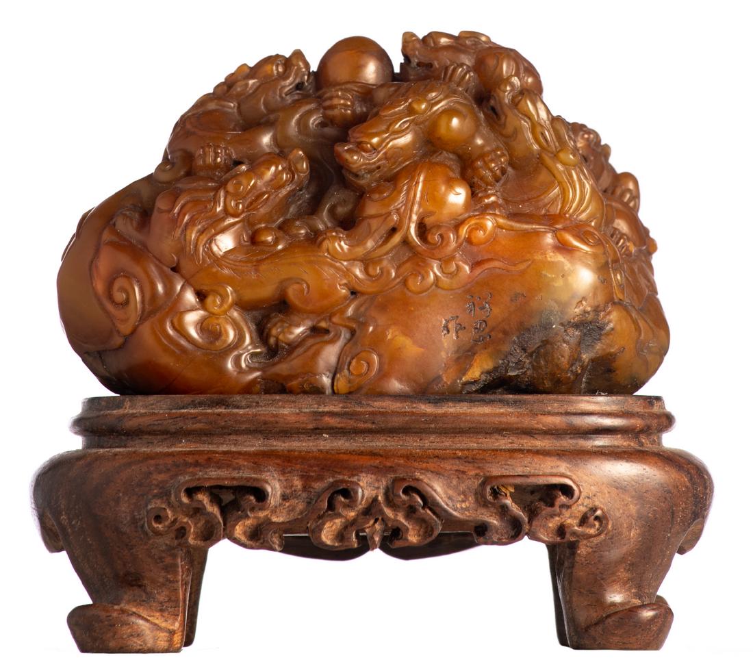 A Chinese carved shoushan stone group, depicting