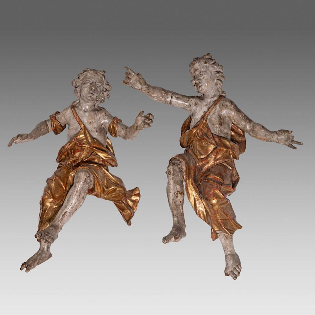 A Large Baroque Pair Of Polychrome And Gilt Limewood Sculptures Of ...