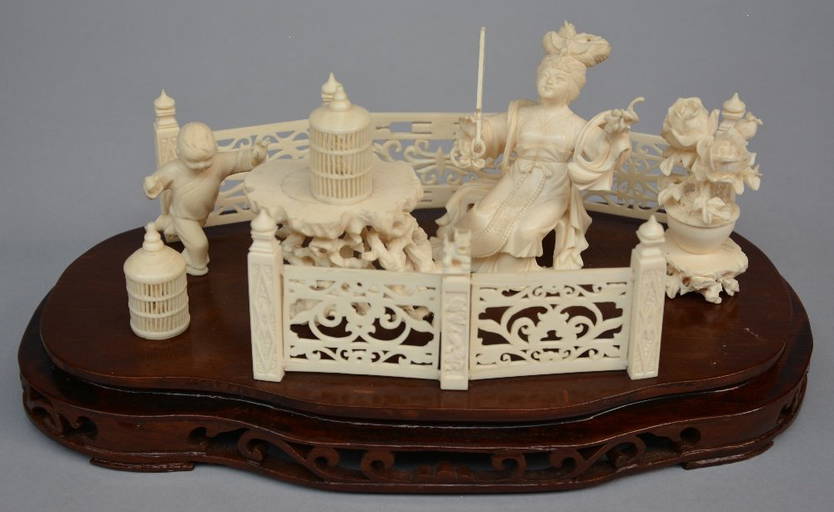 A Chinese Ivory Sculpture Depicting An Animated Garden