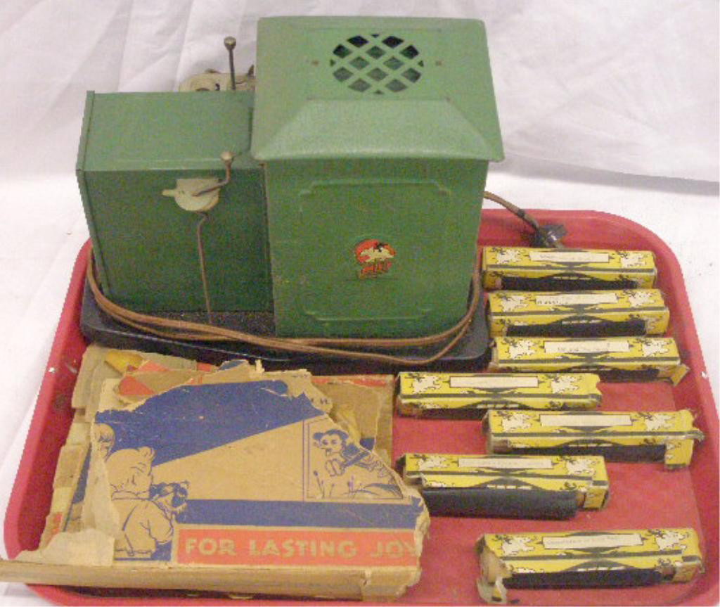 180: 1930's NIC Toy Projector & Films
