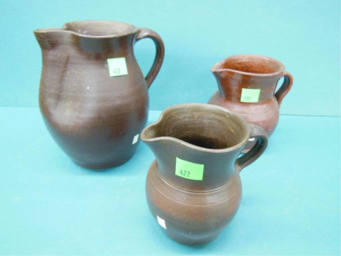 Three 19th C. Redware Pitchers