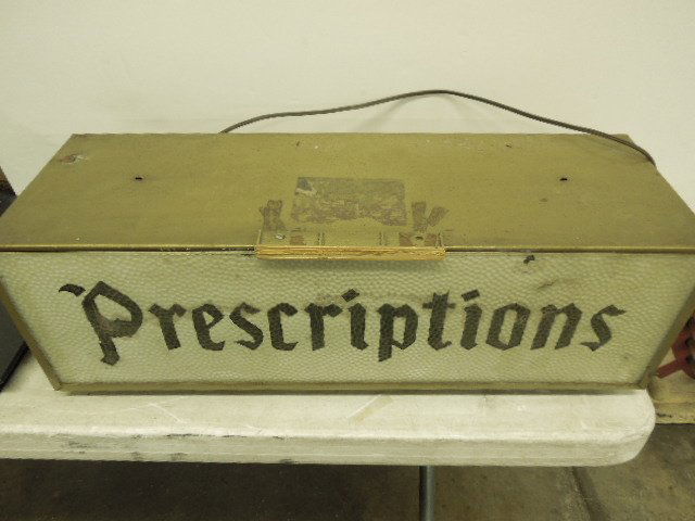 Vintage lighted Prescriptions sign