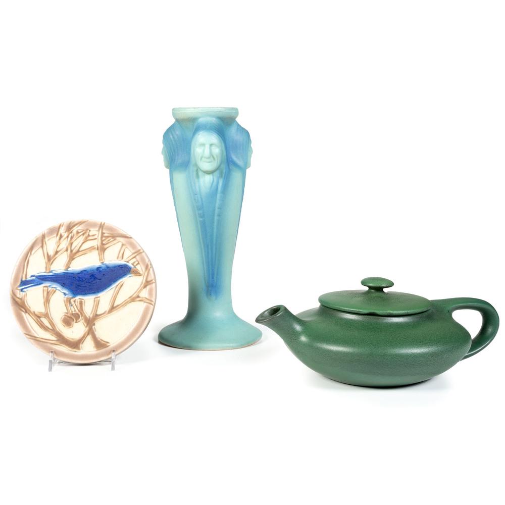 A Van Briggle Indian Head Vase And Other Art Pottery