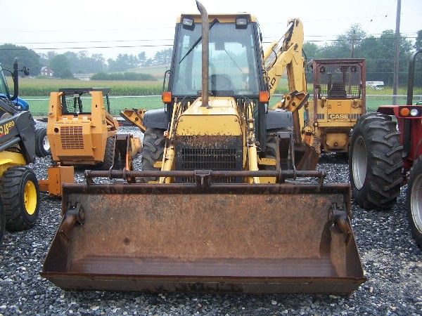 1145: FORD 655D 4X4 TRACTOR LOADER BACKHOE W/ CAB!!