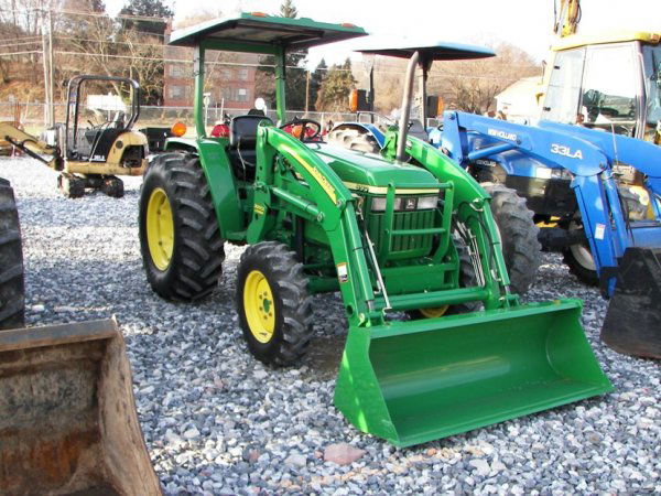 1216: John Deere 990 4x4 Compact Tractor with Loader