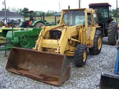 1348: Ford 545C 4x4 Tractor with Loader, Sims Cab