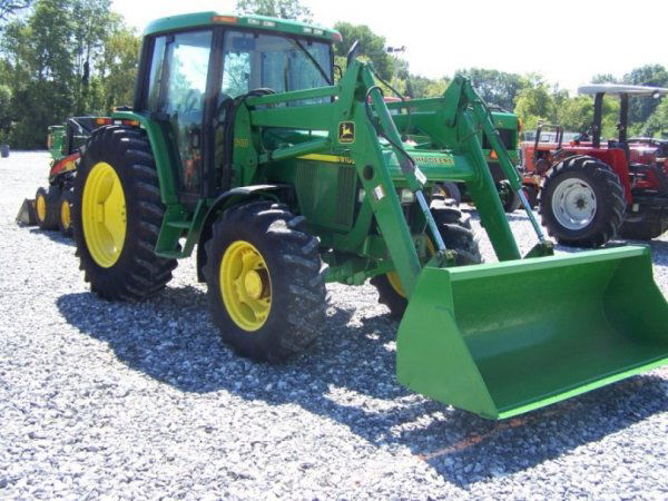 4149: John Deere 6410 4x4 Farm Tractor w/ Cab & Loader
