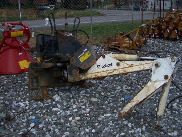 1068A: Bobcat 907 Skid Loader Backhoe Attachment