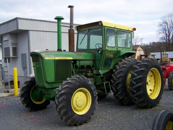 2234: John Deere 4620 4x4 Farm Tractor with Cab