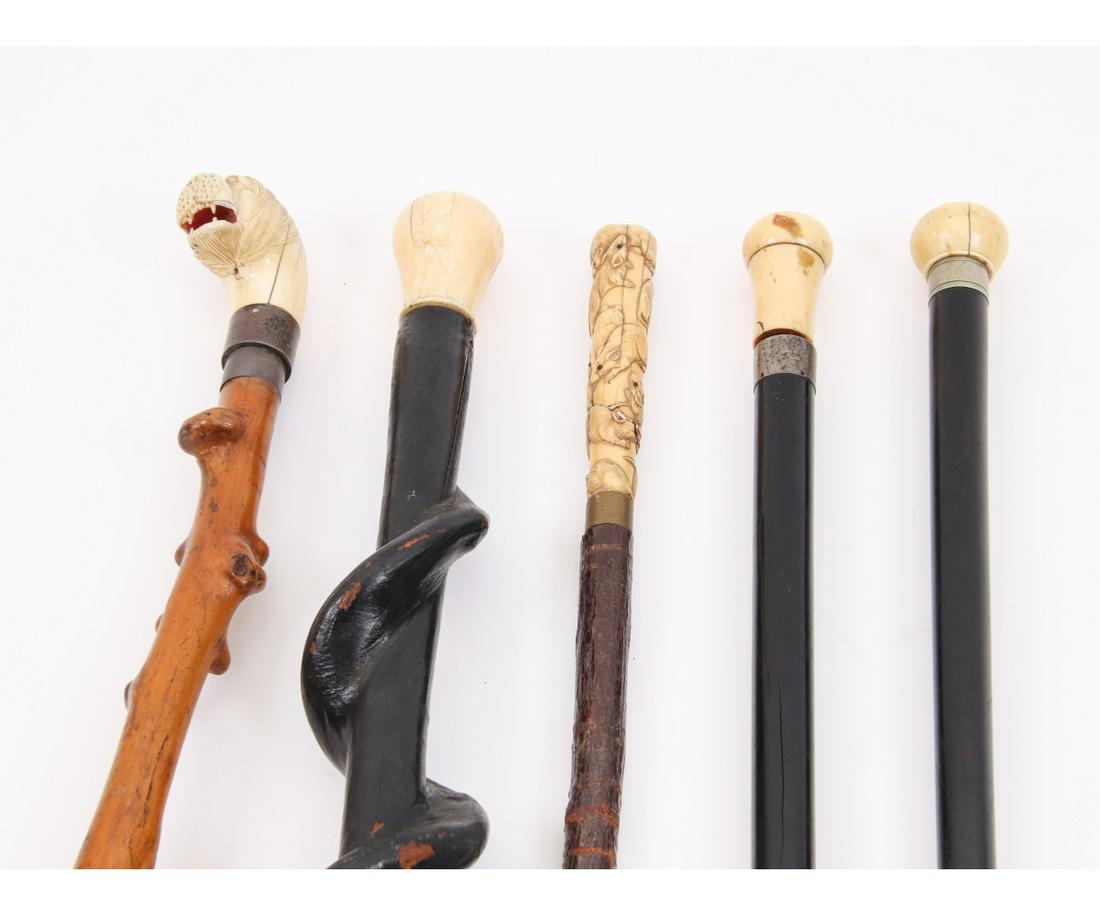 Five Carved Walking Sticks