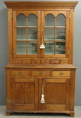 Pine two piece Dutch cupboard, c.1820, with a molded