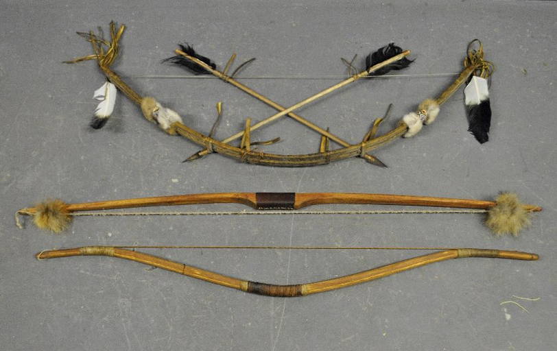 Three Southwest Indian Bows Incl. A Leather Covered