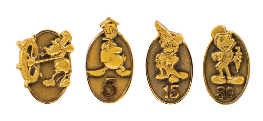 Collection Of (4) Disneyland Cast Member Service Pins.