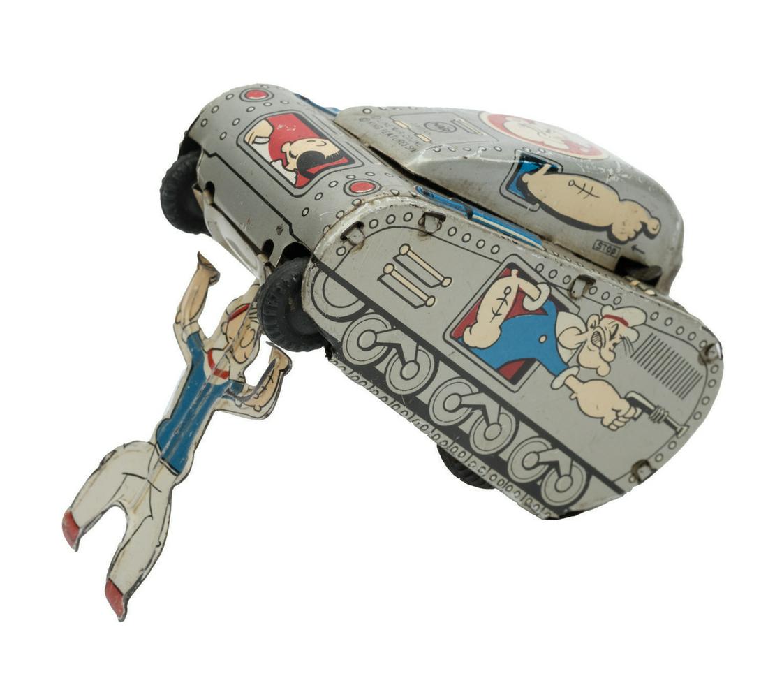 A Popeye Wind Up Turnover Tank By Linemar.