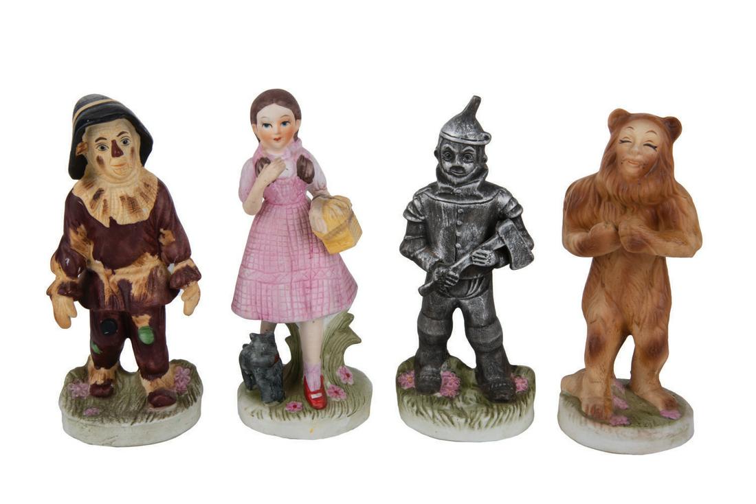 A Collection Of (4) Wizard Of Oz Porcelain Figures.