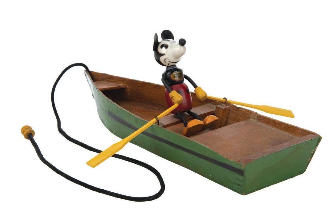 A Rare Mickey Mouse Fun E Flex Rowboat.