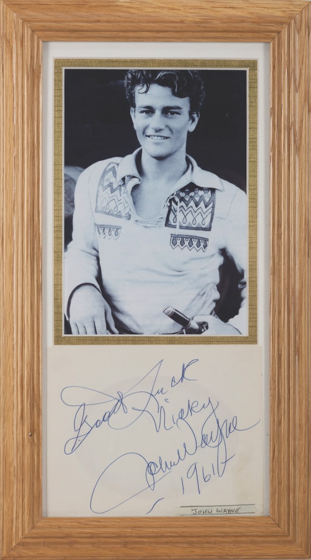 A John Wayne Signature With Photo. Auction