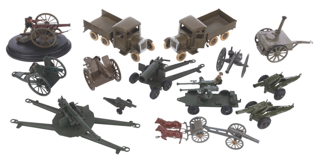 A Collection Of Toy Gun Turrets And Military Trucks. Auction