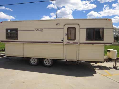 1991 pop-up Funlite camper by Hi-Lo.