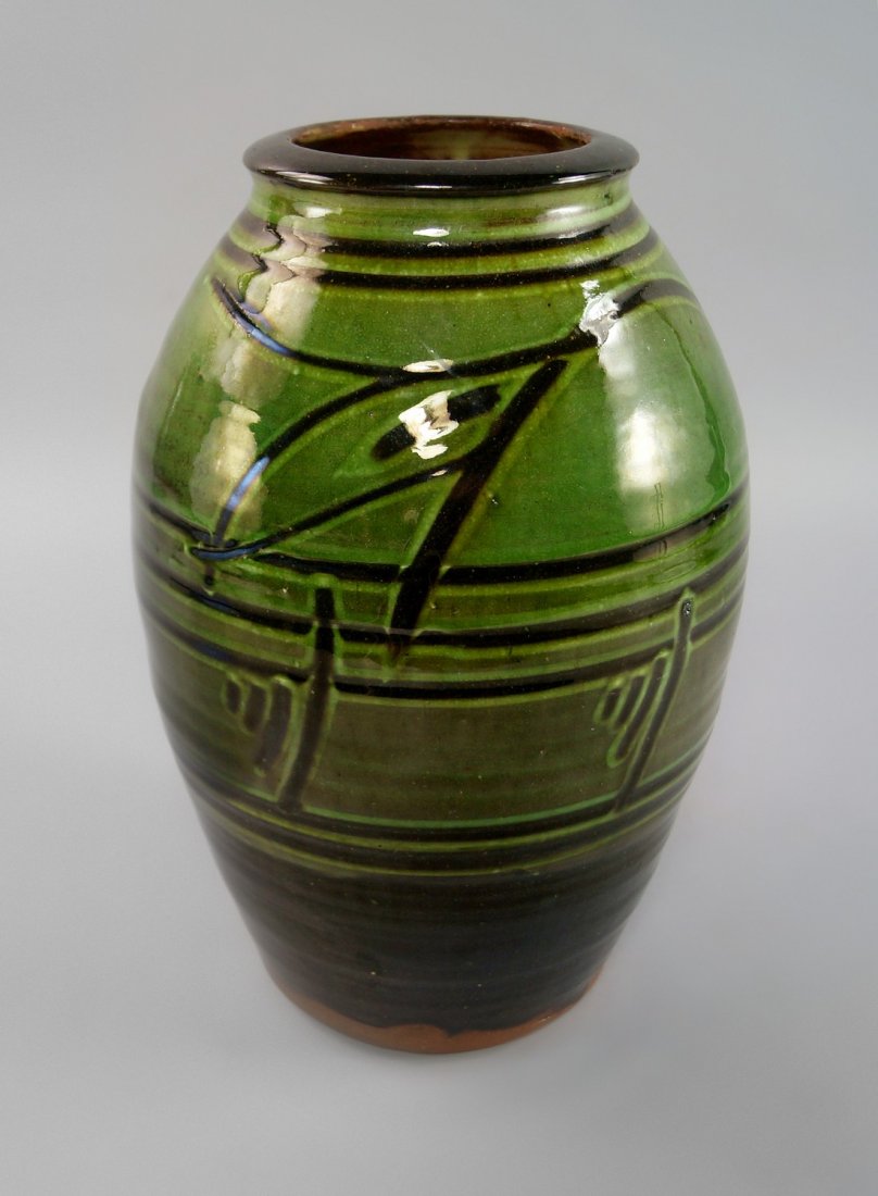 Michael Cardew OBE, British, 1901-1983, a tall green