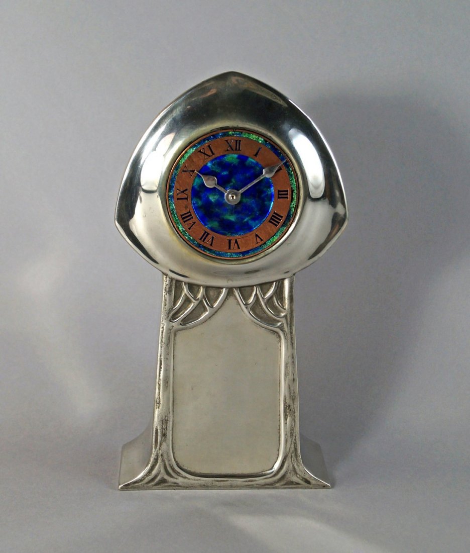 A Liberty and Co Tudric pewter and enamel clock