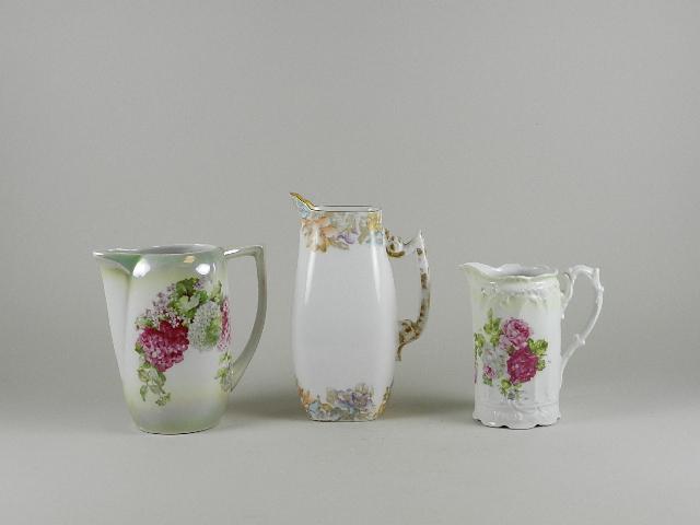 Three Transfer Decorated Pitchers