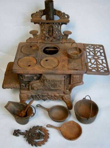 Vintage Crescent Cast Iron Toy Stove With Assorted Pots