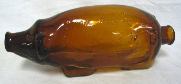 AMBER HOG BOURBON BOTTLE